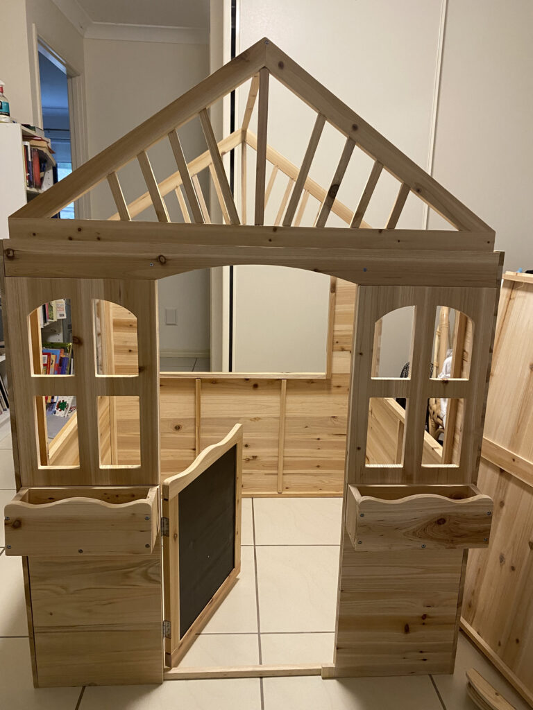 Epic Kmart cubby house hack into a life-size Gingerbread House!